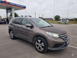 Brūns Honda CR-V 2014 Tauragė, ar dzinēja tilpumu 2.20 L un nobraukumu 170 tūkst. km par 7700 €, foto 5 vietnē AUTOMOTO.COM.LV