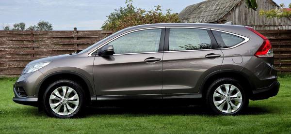 Brown Honda CR-V 2014 in Prienai, with an engine capacity of 1.60 L and mileage of 299 thousand km for 7250 €, photo 5 on AUTOMOTO.COM.LV
