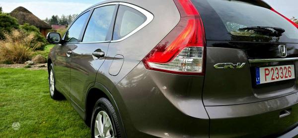 Brown Honda CR-V 2014 in Prienai, with an engine capacity of 1.60 L and mileage of 299 thousand km for 7250 €, photo 11 on AUTOMOTO.COM.LV