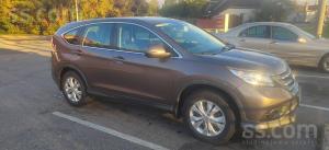 Brown Honda CR-V 2014 in Daugavpils, with an engine capacity of 2.00 L and mileage of 138 thousand km for 14900 €, photo 3 on AUTOMOTO.COM.LV