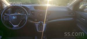 Brown Honda CR-V 2014 in Daugavpils, with an engine capacity of 2.00 L and mileage of 138 thousand km for 14900 €, photo 5 on AUTOMOTO.COM.LV