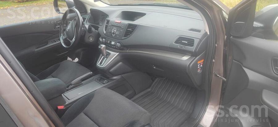 Brown Honda CR-V 2014 in Daugavpils, with an engine capacity of 2.00 L and mileage of 138 thousand km for 14900 €, photo 13 on AUTOMOTO.COM.LV