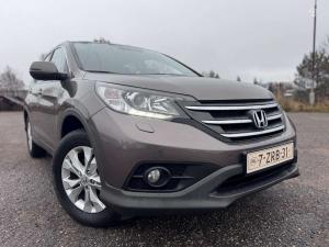 Brown Honda CR-V 2015 in Alytus, with an engine capacity of 1.60 L and mileage of 247 thousand km for 10350 €, photo  on AUTOMOTO.COM.LV