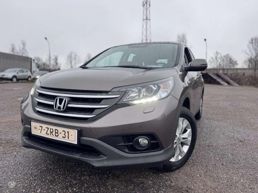 Brūns Honda CR-V 2015 Alīta, ar dzinēja tilpumu 1.60 L un nobraukumu 247 tūkst. km par 10350 €, foto 2 vietnē AUTOMOTO.COM.LV