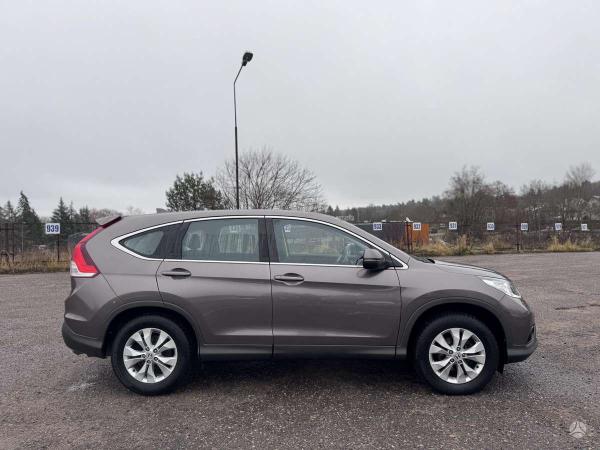 Brūns Honda CR-V 2015 Alīta, ar dzinēja tilpumu 1.60 L un nobraukumu 247 tūkst. km par 10350 €, foto 5 vietnē AUTOMOTO.COM.LV