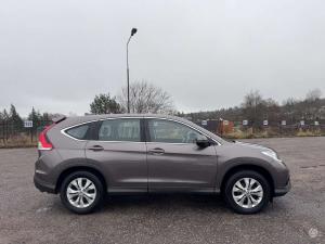 Brūns Honda CR-V 2015 Alīta, ar dzinēja tilpumu 1.60 L un nobraukumu 247 tūkst. km par 10350 €, foto 5 vietnē AUTOMOTO.COM.LV
