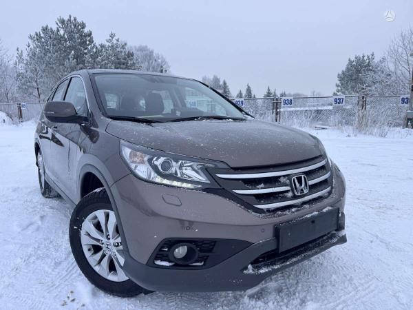 Brown Honda CR-V 2015 in Alytus, with an engine capacity of 1.60 L and mileage of 240 thousand km for 10300 €, photo 1 on AUTOMOTO.COM.LV