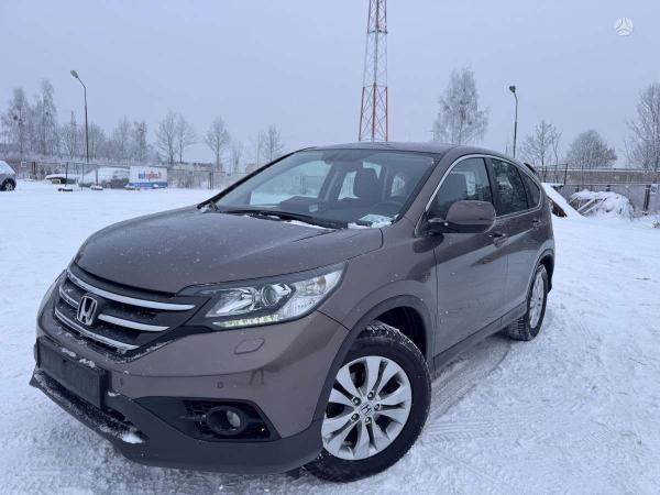 Brown Honda CR-V 2015 in Alytus, with an engine capacity of 1.60 L and mileage of 240 thousand km for 10300 €, photo 4 on AUTOMOTO.COM.LV