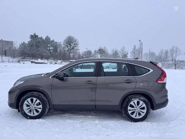 Brown Honda CR-V 2015 in Alytus, with an engine capacity of 1.60 L and mileage of 240 thousand km for 10300 €, photo 7 on AUTOMOTO.COM.LV