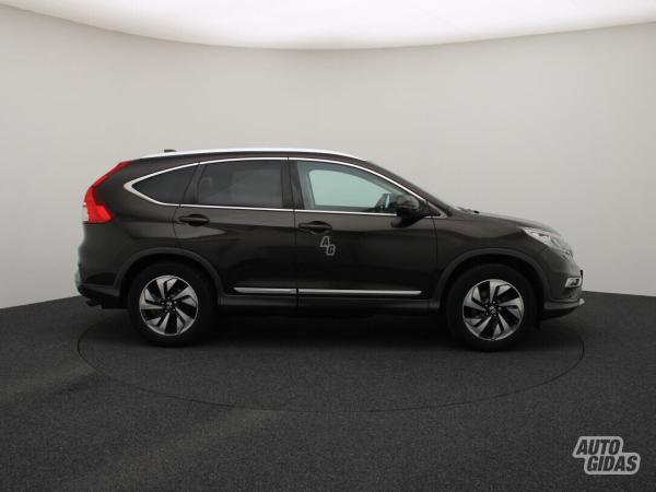 Brown Honda CR-V 2015 in Vilnius, with an engine capacity of 1.60 L and mileage of 235 thousand km for 13799 €, photo 9 on AUTOMOTO.COM.LV