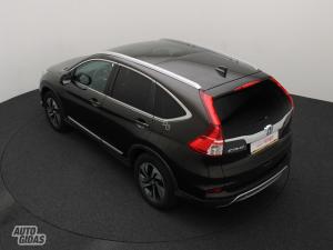 Brown Honda CR-V 2015 in Vilnius, with an engine capacity of 1.60 L and mileage of 235 thousand km for 13799 €, photo 12 on AUTOMOTO.COM.LV