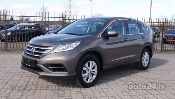 Brown Honda CR-V 2015 in Tartu, with an engine capacity of 1.60 L and mileage of 142 thousand km for 13950 €, photo 1 on AUTOMOTO.COM.LV