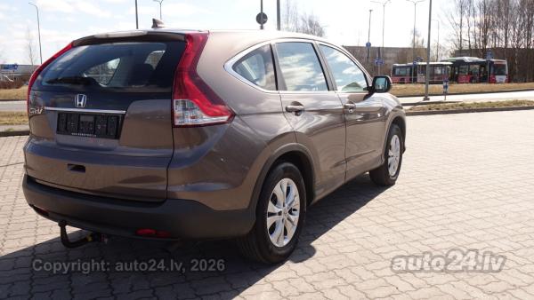 Brown Honda CR-V 2015 in Tartu, with an engine capacity of 1.60 L and mileage of 142 thousand km for 13950 €, photo 3 on AUTOMOTO.COM.LV