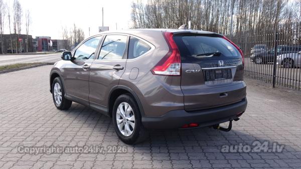 Brown Honda CR-V 2015 in Tartu, with an engine capacity of 1.60 L and mileage of 142 thousand km for 13950 €, photo 5 on AUTOMOTO.COM.LV