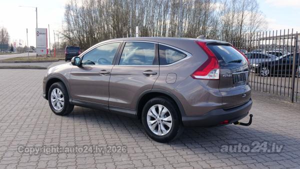Brown Honda CR-V 2015 in Tartu, with an engine capacity of 1.60 L and mileage of 142 thousand km for 13950 €, photo 6 on AUTOMOTO.COM.LV