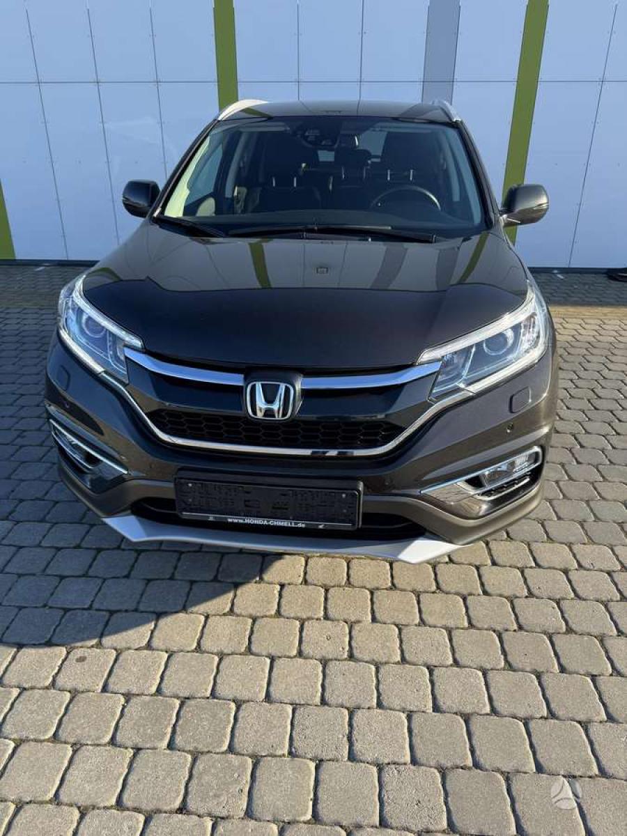 Brown Honda CR-V 2015 in Raseiniai, with an engine capacity of 1.60 L and mileage of 124 thousand km for 12500 €, photo 1 on AUTOMOTO.COM.LV