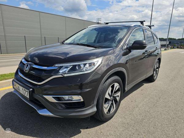 Brown Honda CR-V 2015 in Kaunas, with an engine capacity of 1.60 L and mileage of 166 thousand km for 10300 €, photo 2 on AUTOMOTO.COM.LV