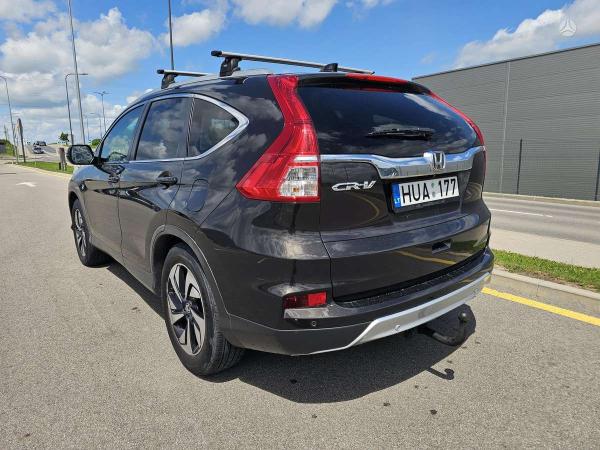 Brown Honda CR-V 2015 in Kaunas, with an engine capacity of 1.60 L and mileage of 166 thousand km for 10300 €, photo 9 on AUTOMOTO.COM.LV