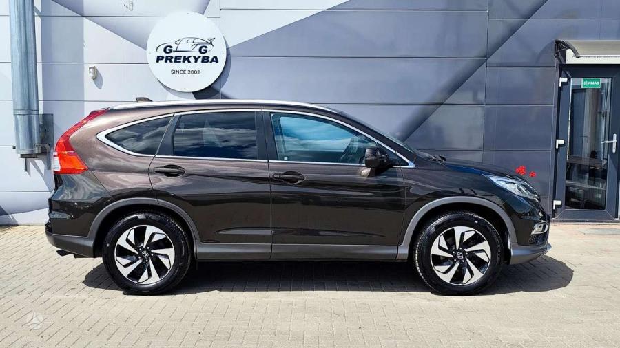 Brown Honda CR-V 2015 in Kaunas, with an engine capacity of 1.60 L and mileage of 184 thousand km for 12950 €, photo 6 on AUTOMOTO.COM.LV