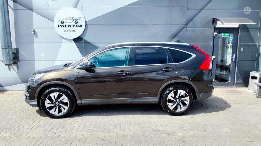 Brown Honda CR-V 2015 in Kaunas, with an engine capacity of 1.60 L and mileage of 184 thousand km for 12950 €, photo 7 on AUTOMOTO.COM.LV