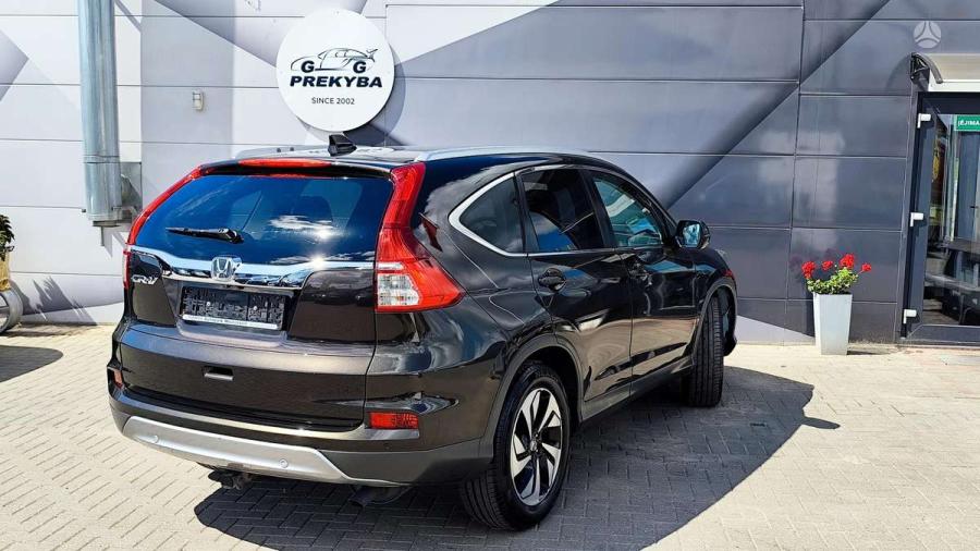 Brown Honda CR-V 2015 in Kaunas, with an engine capacity of 1.60 L and mileage of 184 thousand km for 12950 €, photo 10 on AUTOMOTO.COM.LV