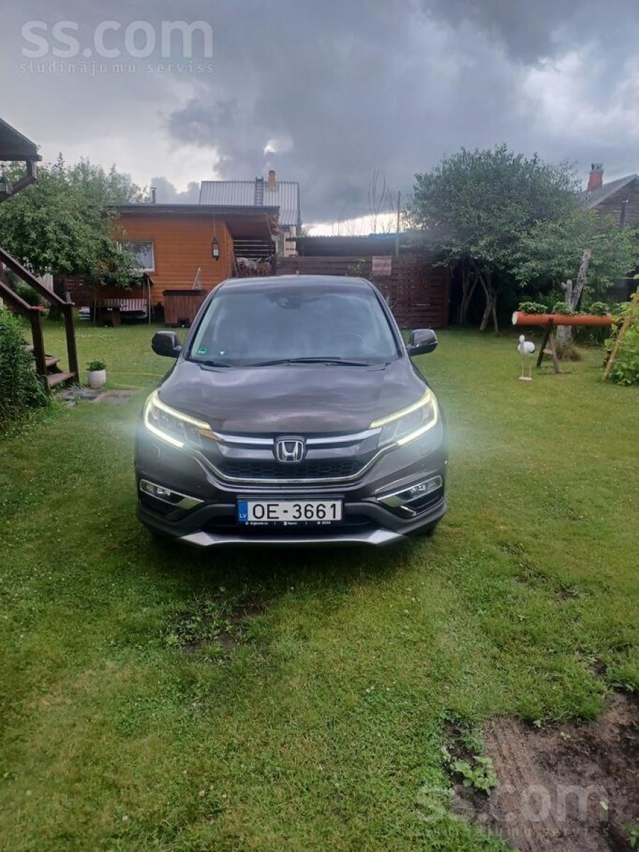 Brown Honda CR-V 2015 in Daugavpils, with an engine capacity of 1.60 L and mileage of 270 thousand km for 15000 €, photo 3 on AUTOMOTO.COM.LV