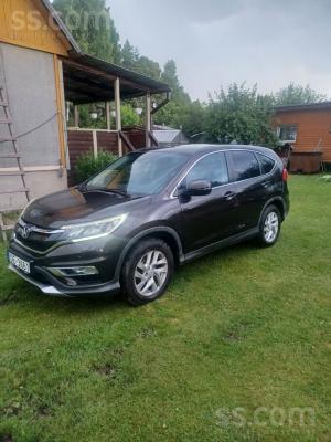 Brown Honda CR-V 2015 in Daugavpils, with an engine capacity of 1.60 L and mileage of 270 thousand km for 15000 €, photo 4 on AUTOMOTO.COM.LV