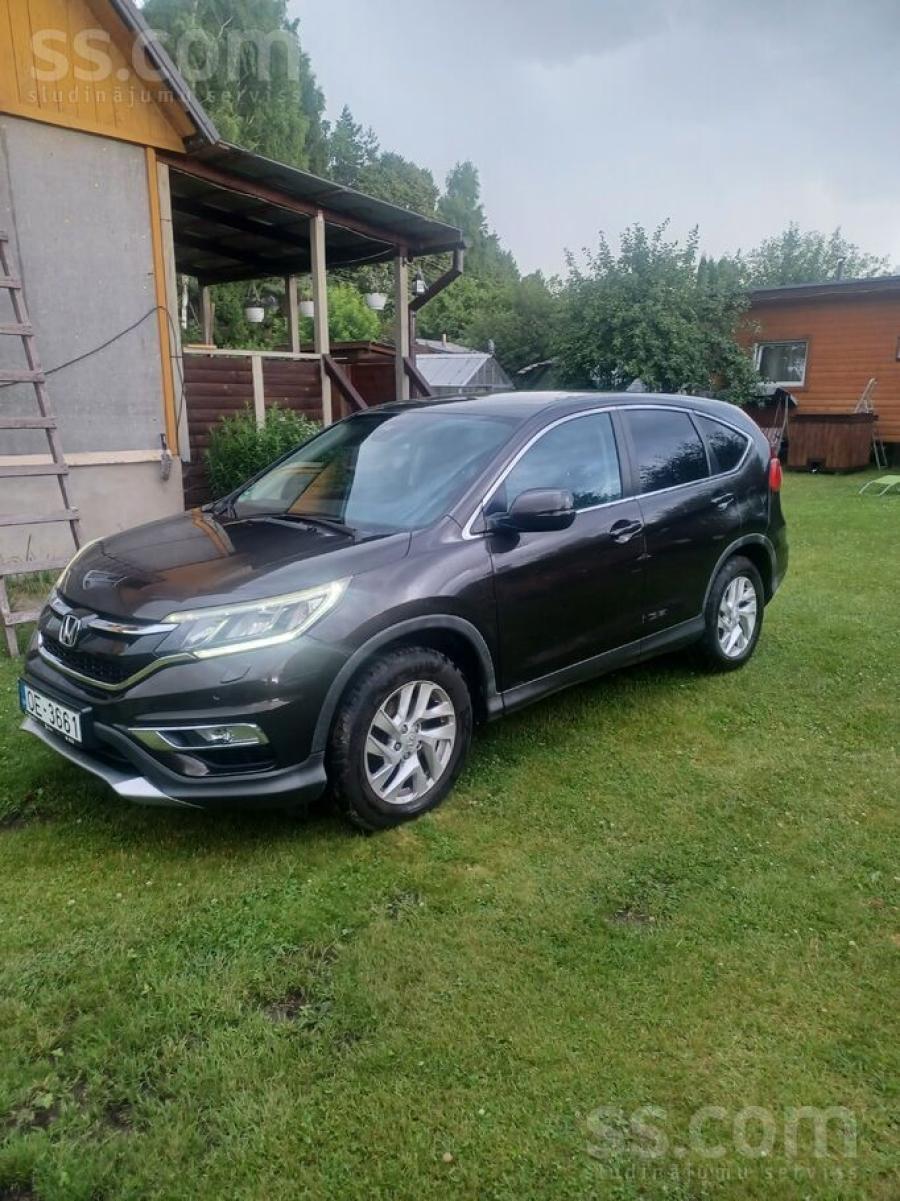 Brown Honda CR-V 2015 in Daugavpils, with an engine capacity of 1.60 L and mileage of 270 thousand km for 15000 €, photo 4 on AUTOMOTO.COM.LV