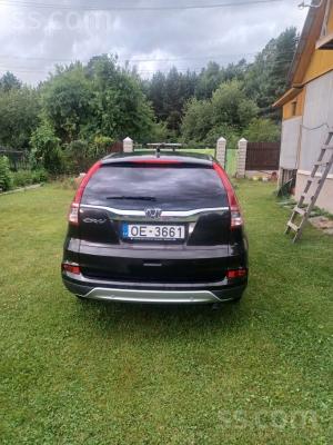 Brown Honda CR-V 2015 in Daugavpils, with an engine capacity of 1.60 L and mileage of 270 thousand km for 15000 €, photo 5 on AUTOMOTO.COM.LV