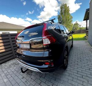 Brown Honda CR-V 2015 in Vilnius, with an engine capacity of 1.60 L and mileage of 165 thousand km for 13750 €, photo 4 on AUTOMOTO.COM.LV