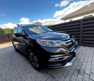 Brown Honda CR-V 2015 in Vilnius, with an engine capacity of 1.60 L and mileage of 165 thousand km for 13750 €, photo 7 on AUTOMOTO.COM.LV