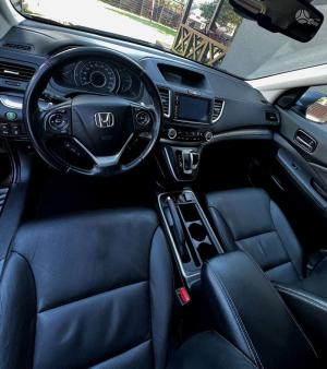 Brown Honda CR-V 2015 in Vilnius, with an engine capacity of 1.60 L and mileage of 165 thousand km for 13750 €, photo 14 on AUTOMOTO.COM.LV