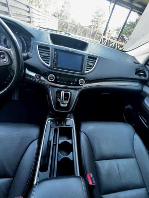 Brown Honda CR-V 2015 in Vilnius, with an engine capacity of 1.60 L and mileage of 165 thousand km for 13750 €, photo 17 on AUTOMOTO.COM.LV