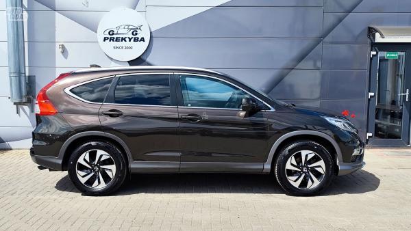 Brown Honda CR-V 2015 in Ramuciai, with an engine capacity of 1.60 L and mileage of 184 thousand km for 12950 €, photo 5 on AUTOMOTO.COM.LV