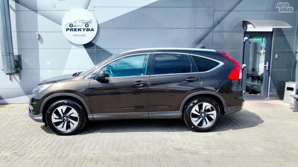 Brown Honda CR-V 2015 in Ramuciai, with an engine capacity of 1.60 L and mileage of 184 thousand km for 12950 €, photo 6 on AUTOMOTO.COM.LV