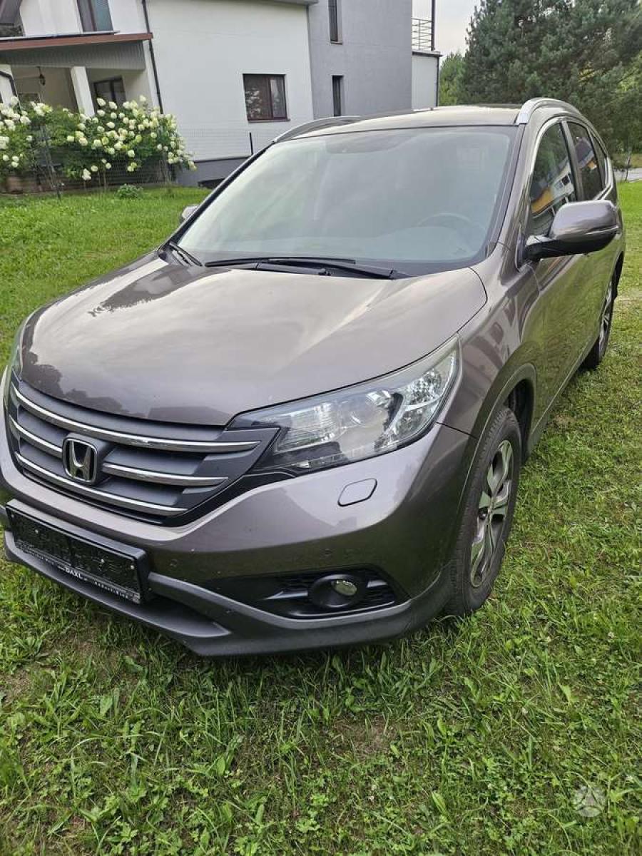 Brūns Honda CR-V 2015 Anykščiai, ar dzinēja tilpumu 2.20 L un nobraukumu 238 tūkst. km par 10500 €, foto 1 vietnē AUTOMOTO.COM.LV