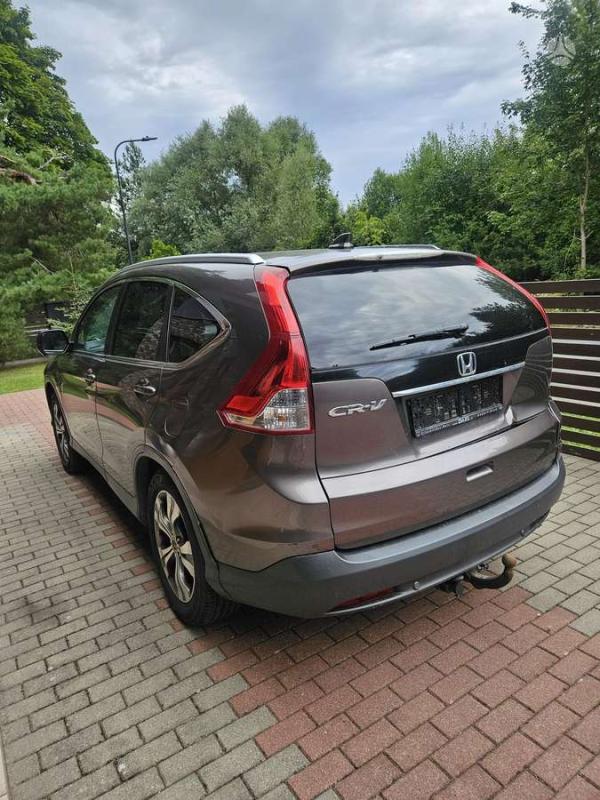 Brūns Honda CR-V 2015 Anykščiai, ar dzinēja tilpumu 2.20 L un nobraukumu 238 tūkst. km par 10500 €, foto 4 vietnē AUTOMOTO.COM.LV