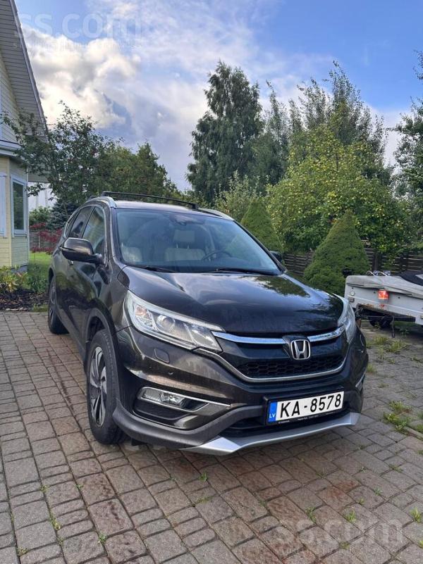 Brown Honda CR-V 2015 in Riga, with an engine capacity of 2.00 L and mileage of 195 thousand km for 13000 €, photo 3 on AUTOMOTO.COM.LV