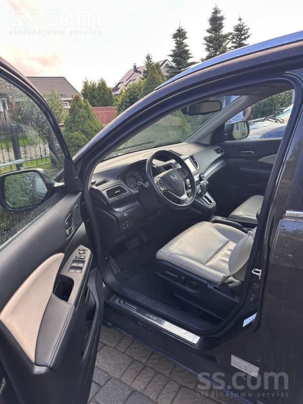 Brown Honda CR-V 2015 in Riga, with an engine capacity of 2.00 L and mileage of 195 thousand km for 13000 €, photo 4 on AUTOMOTO.COM.LV