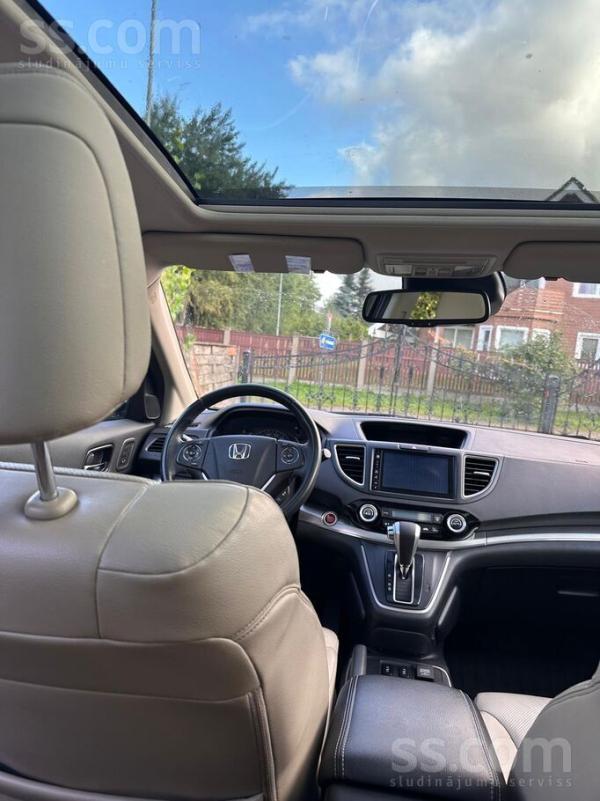 Brown Honda CR-V 2015 in Riga, with an engine capacity of 2.00 L and mileage of 195 thousand km for 13000 €, photo 7 on AUTOMOTO.COM.LV
