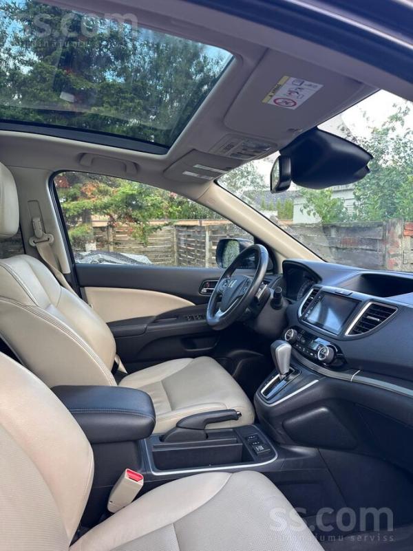 Brown Honda CR-V 2015 in Riga, with an engine capacity of 2.00 L and mileage of 195 thousand km for 13000 €, photo 10 on AUTOMOTO.COM.LV