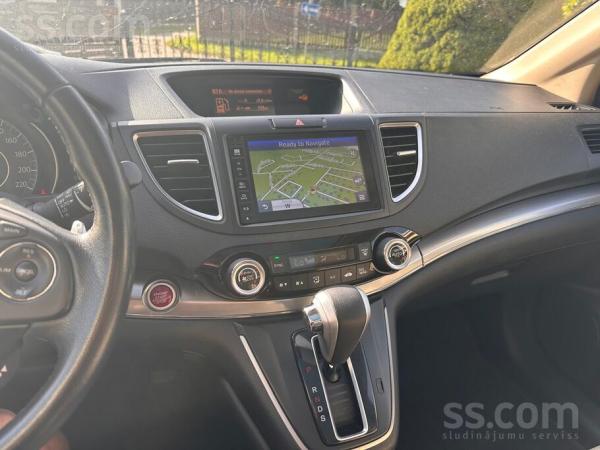 Brown Honda CR-V 2015 in Riga, with an engine capacity of 2.00 L and mileage of 195 thousand km for 13000 €, photo 11 on AUTOMOTO.COM.LV