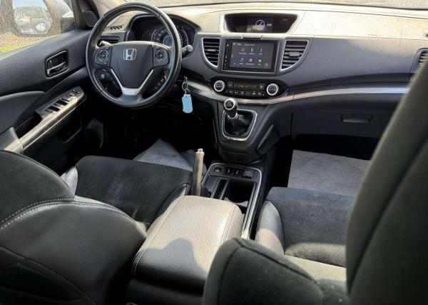 Brown Honda CR-V 2015 in Siauliai, with an engine capacity of 1.60 L and mileage of 125 thousand km for 10900 €, photo 9 on AUTOMOTO.COM.LV