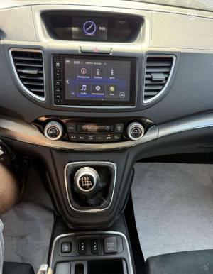 Brown Honda CR-V 2015 in Siauliai, with an engine capacity of 1.60 L and mileage of 125 thousand km for 10900 €, photo 13 on AUTOMOTO.COM.LV