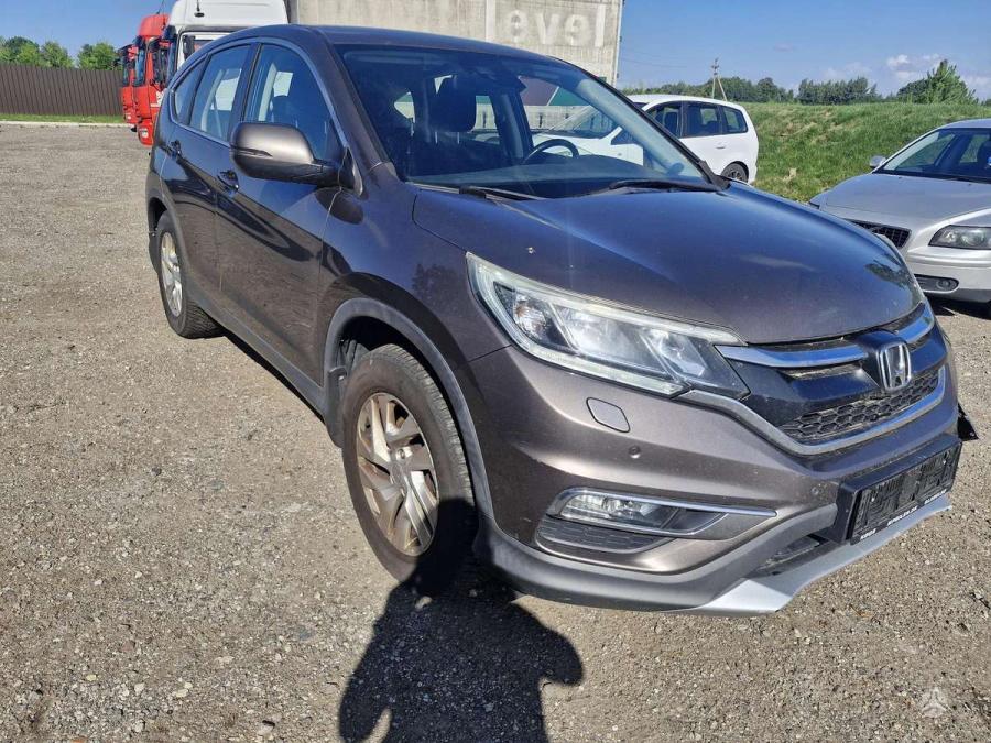 Brown Honda CR-V 2015 in Marijampole, with an engine capacity of 1.60 L and mileage of 450 thousand km for 5500 €, photo 1 on AUTOMOTO.COM.LV