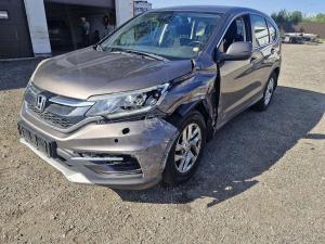 Brown Honda CR-V 2015 in Marijampole, with an engine capacity of 1.60 L and mileage of 450 thousand km for 5500 €, photo 4 on AUTOMOTO.COM.LV