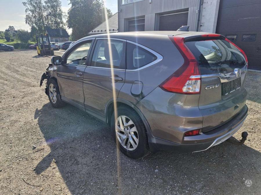 Brown Honda CR-V 2015 in Marijampole, with an engine capacity of 1.60 L and mileage of 450 thousand km for 5500 €, photo 7 on AUTOMOTO.COM.LV
