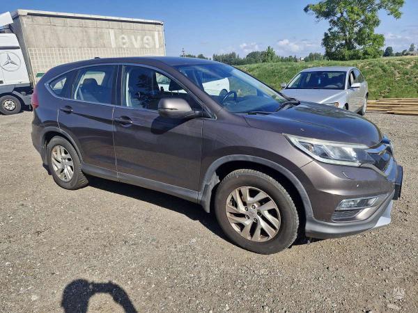 Brown Honda CR-V 2015 in Marijampole, with an engine capacity of 1.60 L and mileage of 450 thousand km for 5500 €, photo 10 on AUTOMOTO.COM.LV