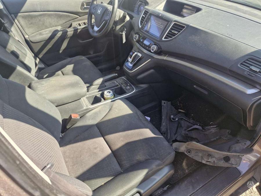 Brown Honda CR-V 2015 in Marijampole, with an engine capacity of 1.60 L and mileage of 450 thousand km for 5500 €, photo 13 on AUTOMOTO.COM.LV
