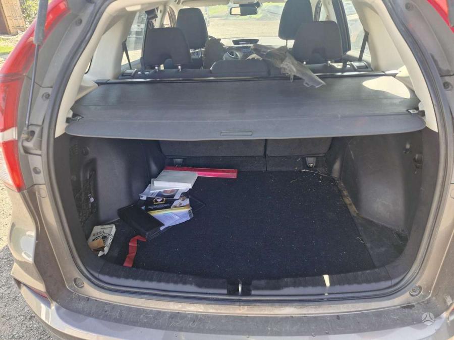 Brown Honda CR-V 2015 in Marijampole, with an engine capacity of 1.60 L and mileage of 450 thousand km for 5500 €, photo 14 on AUTOMOTO.COM.LV